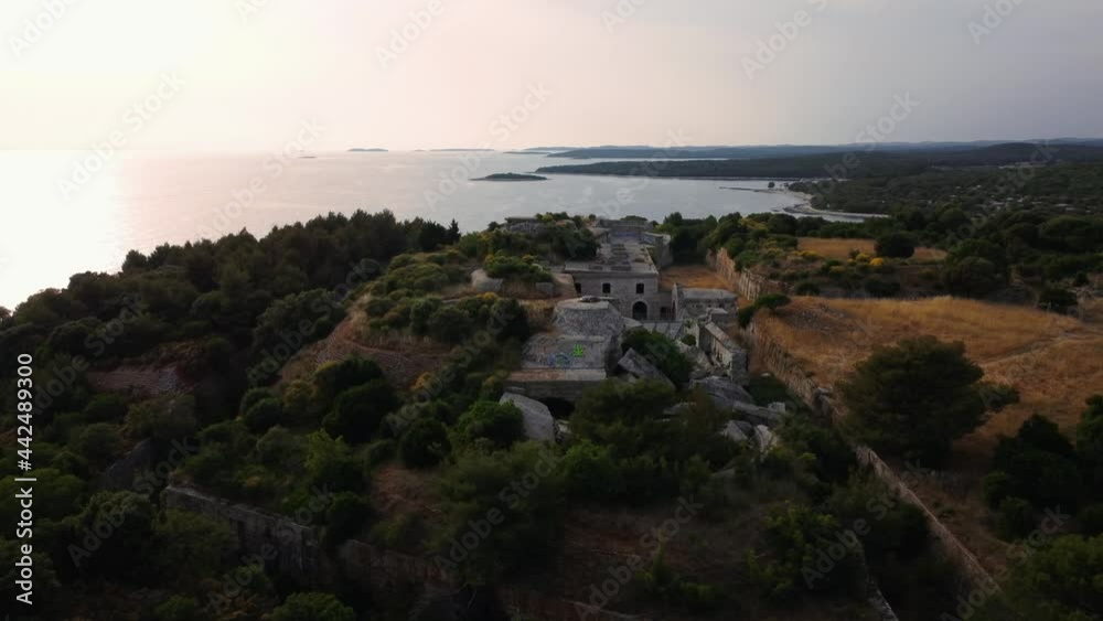 Cinematic aerial view drone sunset circle above a historic World War I ...
