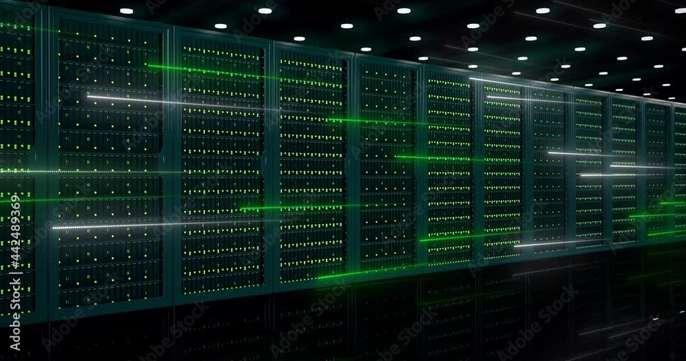 Powerful servers sit behind glass panels in a server room of a data ...