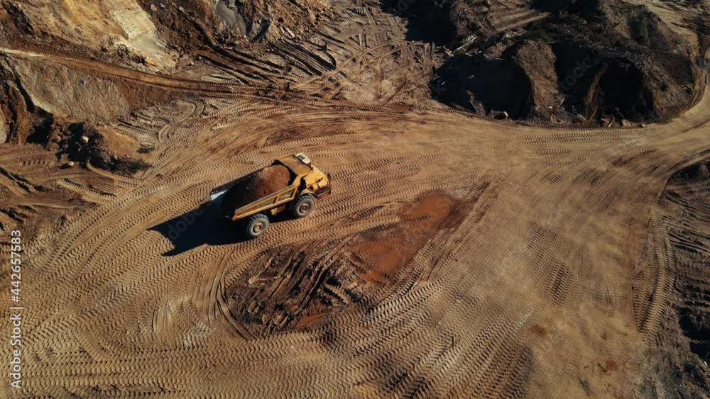 Mining truck transported sand from the open pit. Haul truck working in ...