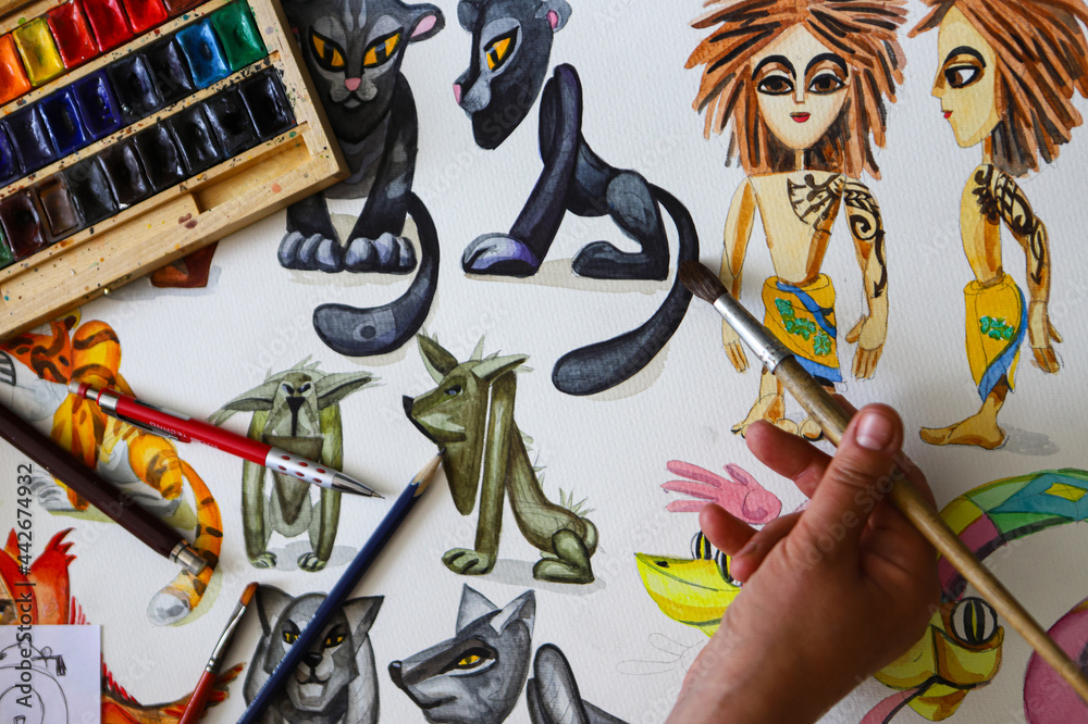 The animator draws with a pencil and draws characters from cartoons ...