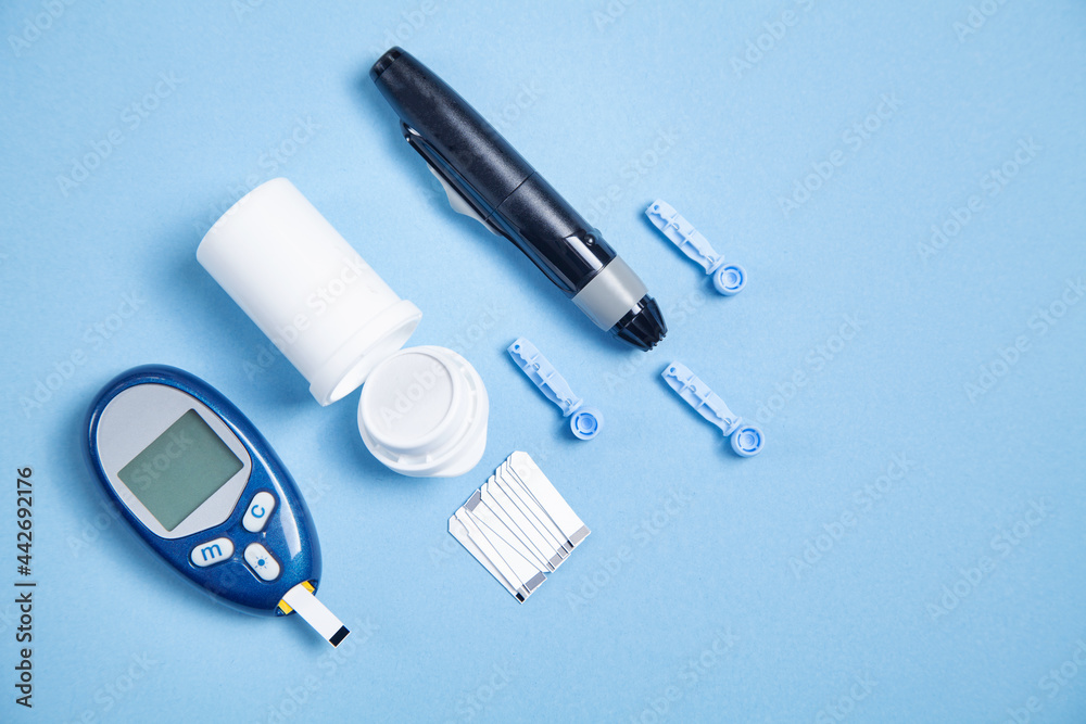 Glucometer with test strips and other objects. Devices for measuring of ...