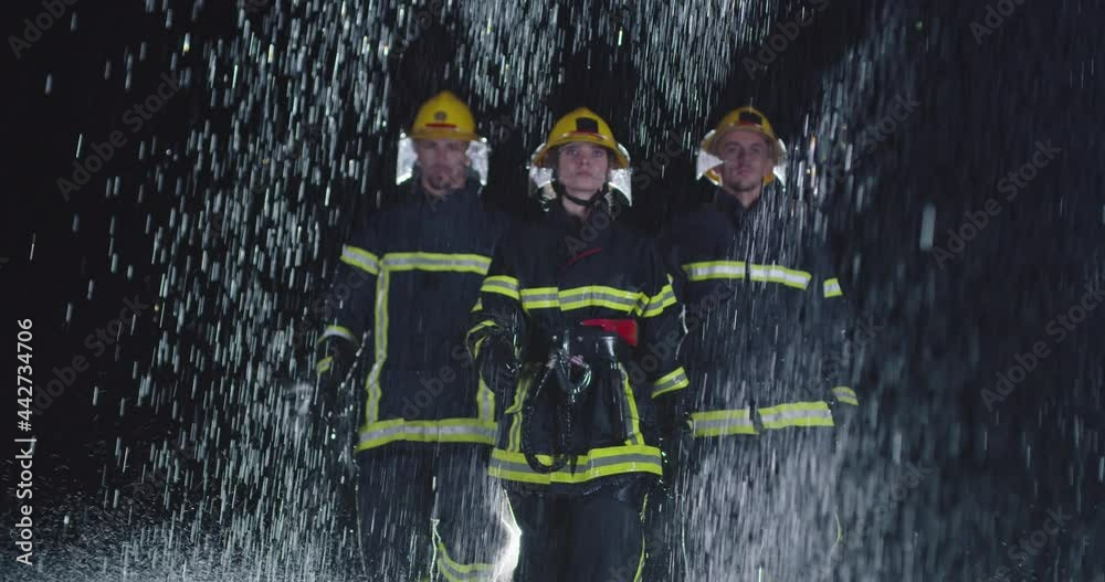 Portrait of the Brave Male and Female Firefighter Group Walking to the ...