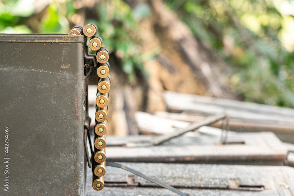 Sniper rifle or heavy machine gun bullets which is packed in the metal ...
