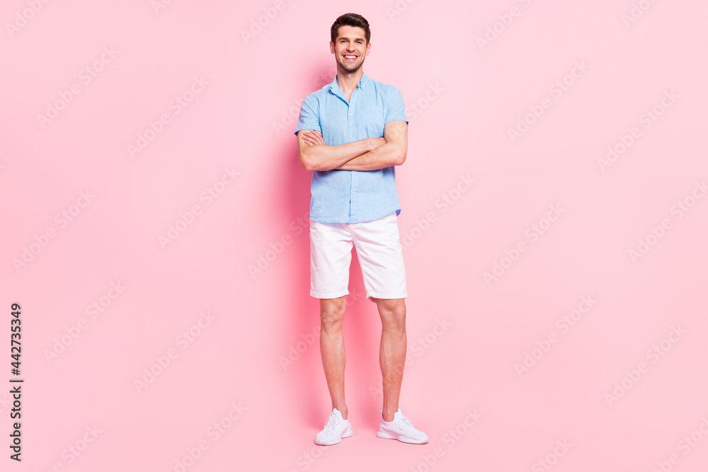 Full length bdoy size view of attractive cheerful guy folded arms ...