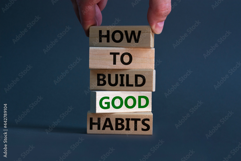Build good habits symbol. Wooden blocks with words 'how to build good ...