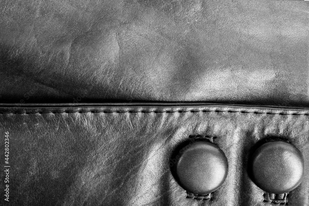 Texture photo of black leather jacket texture with seam and buttons ...