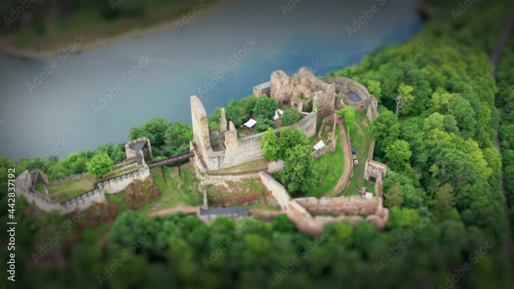 A flight above spectacular ruins of the Cornstein castle. Standing on ...