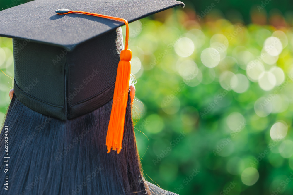 New graduate students wear gowns, carry certificates and beautiful ...