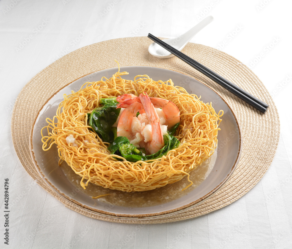 deep fried crispy yellow noodle mee with seafood big prawn and ...