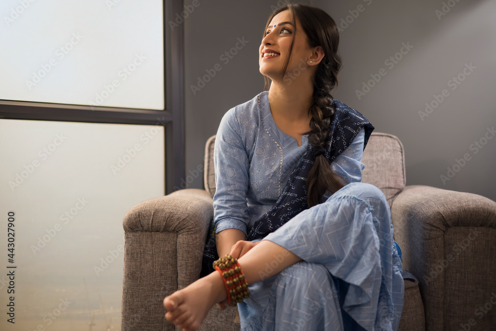 A dancer wearing ghunghroo gazing elsewhere. Stock Photo | Adobe Stock