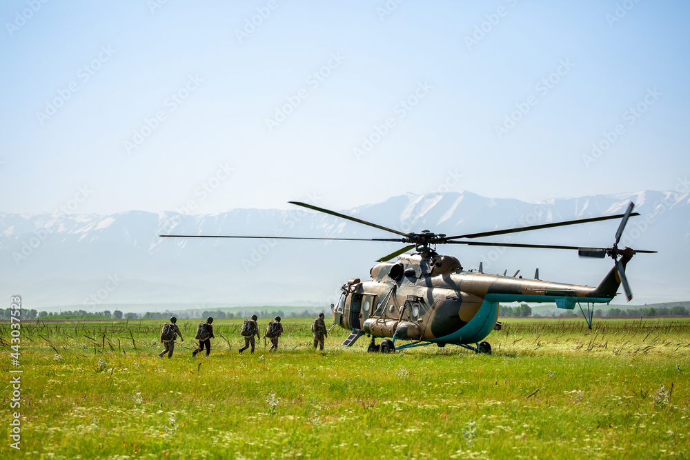 Military helicopter with soldiers. Armed conflict between Israel and ...