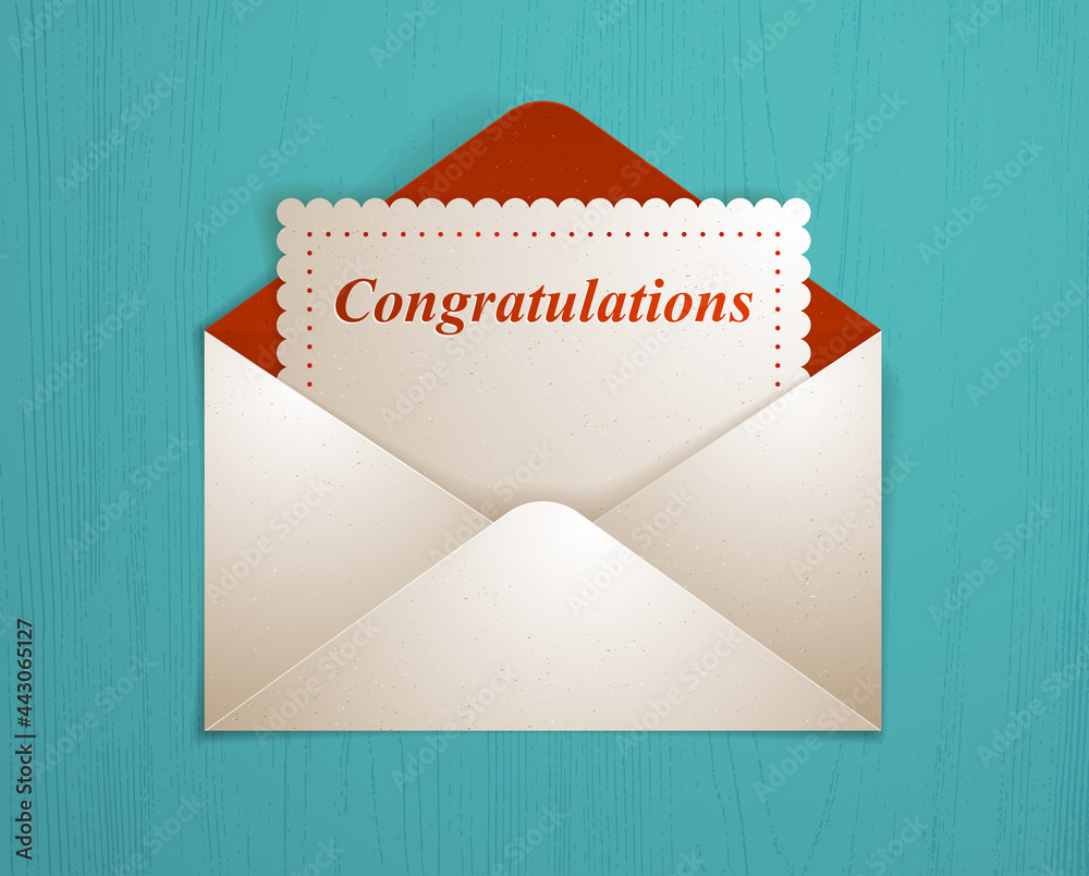 Postal envelope with congratulations card over wooden background ...