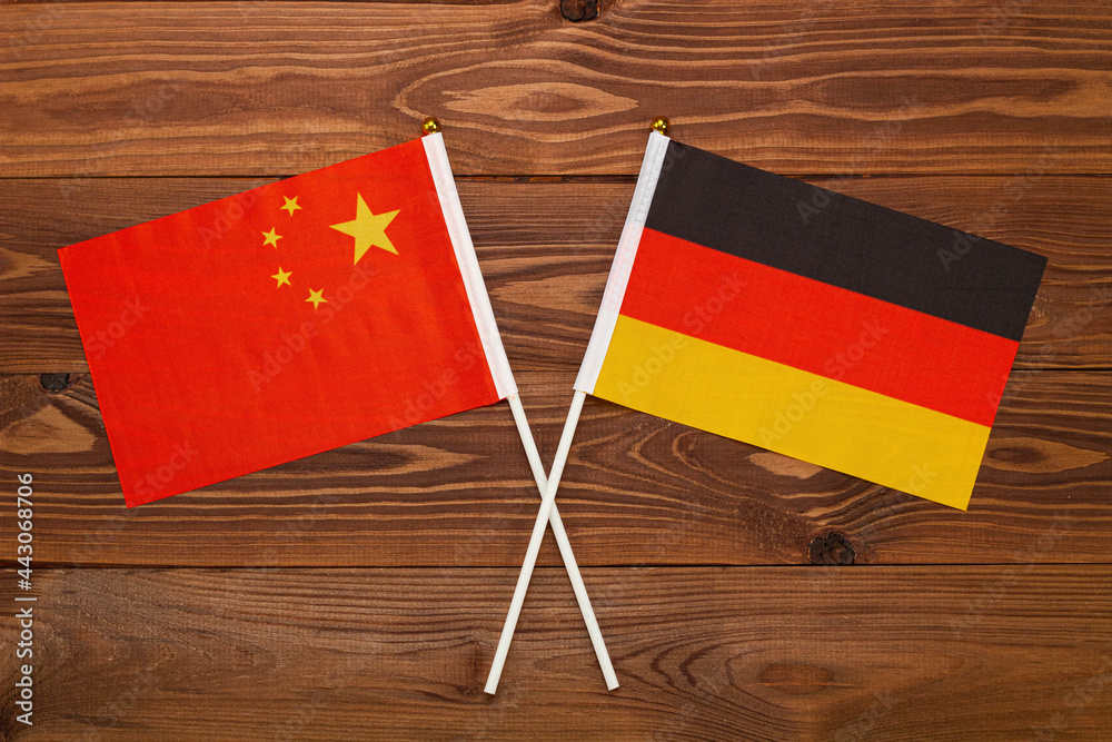 Flag of China and flag of * crossed with each other. The image ...
