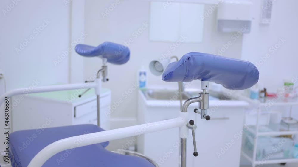 Blue gynecological chair in the women's health clinic. Close-up of an ...