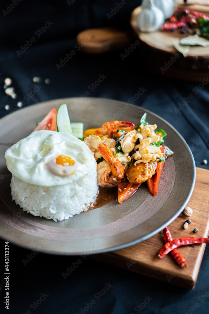 Pad Krapow seafood with fried egg , Thai basil seafood - Asian food ...