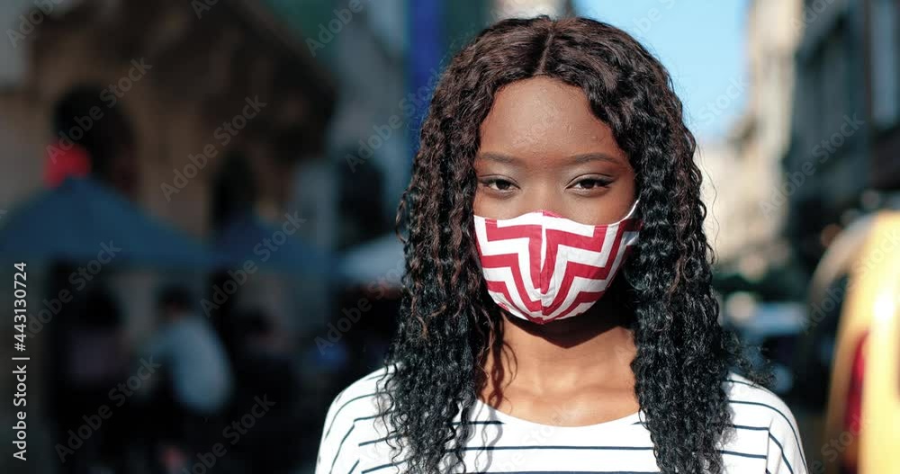 Pandemic, Portrait of the young multiracial woman wearing protective ...
