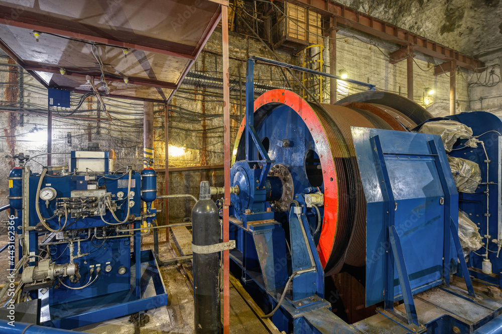 Huge shaft elevator machine. Modern equipment for lifting and lowering ...