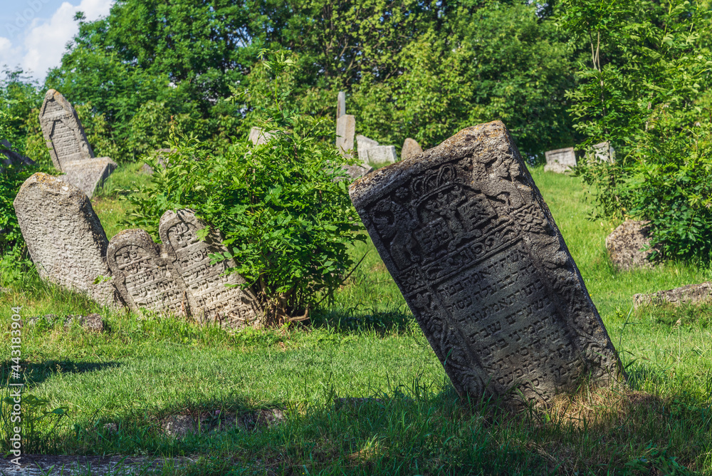 Ukraine, Busk - june, 2021: Old headstones (grave markers, tombstones ...