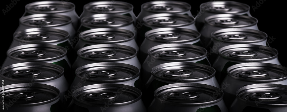 Focus on the front. Close-up aluminum drink can on the background, side ...