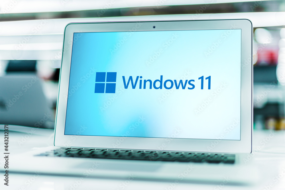 Laptop computer displaying logo of Windows 11 Stock-Foto | Adobe Stock