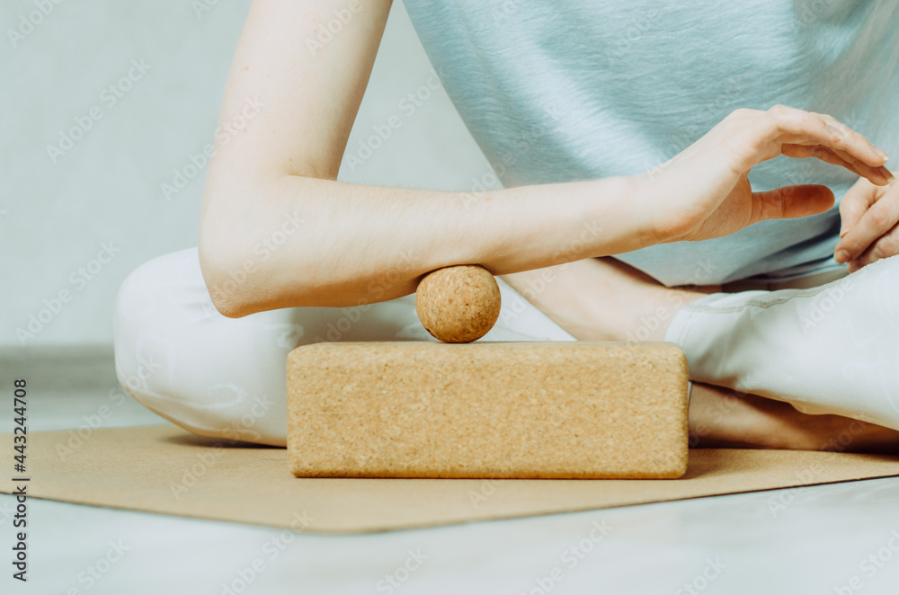 Forearm muscles myofascial release with massage ball on cork block ...