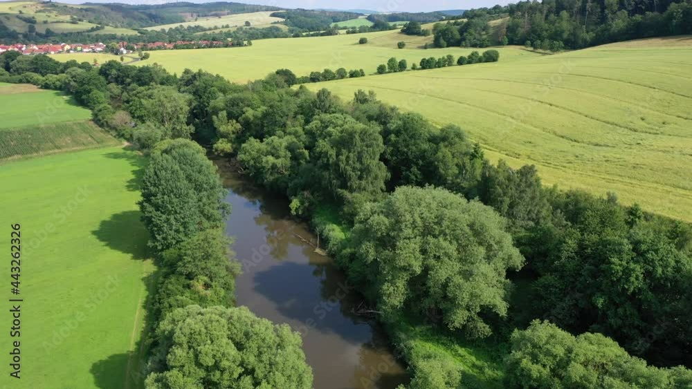 The landscape of the Werra Valley with the Werra River and agriculture ...