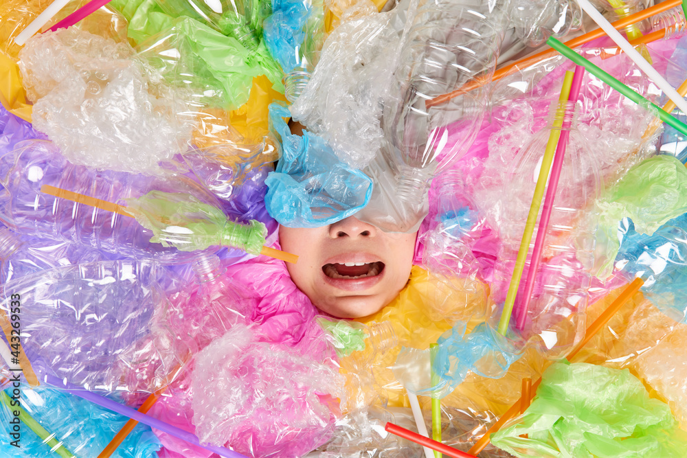 Unrecognizable woman cries from despair as being buried in plastic ...
