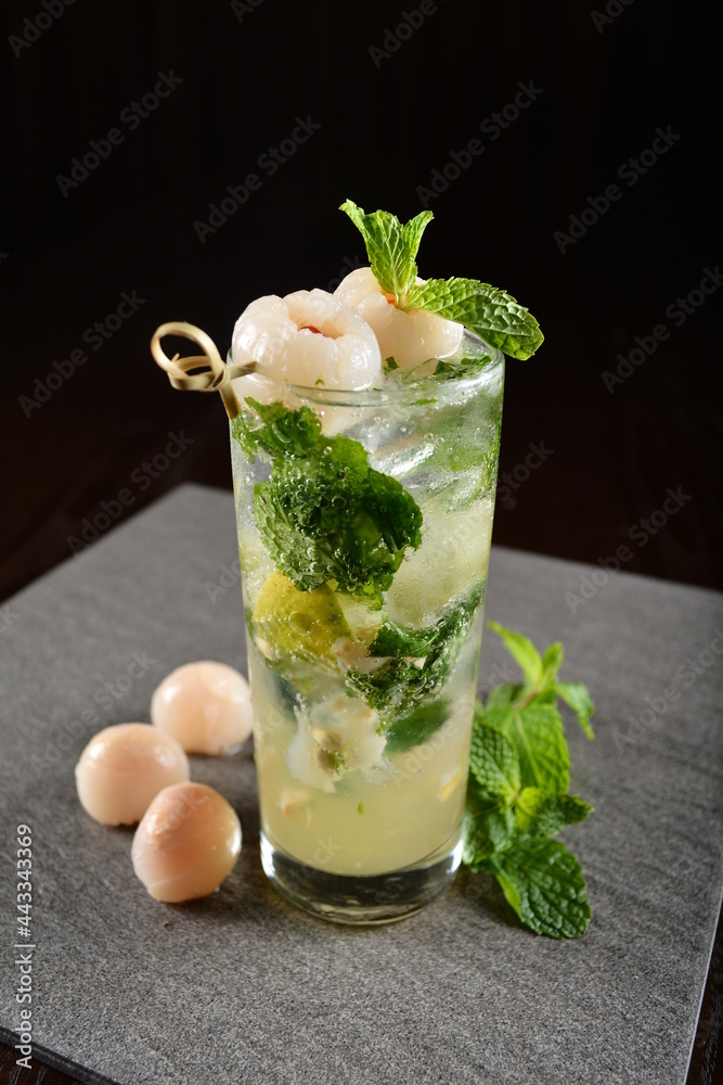 iced lychee longan mint fizz mocktail with mint leaf kombucha in glass ...