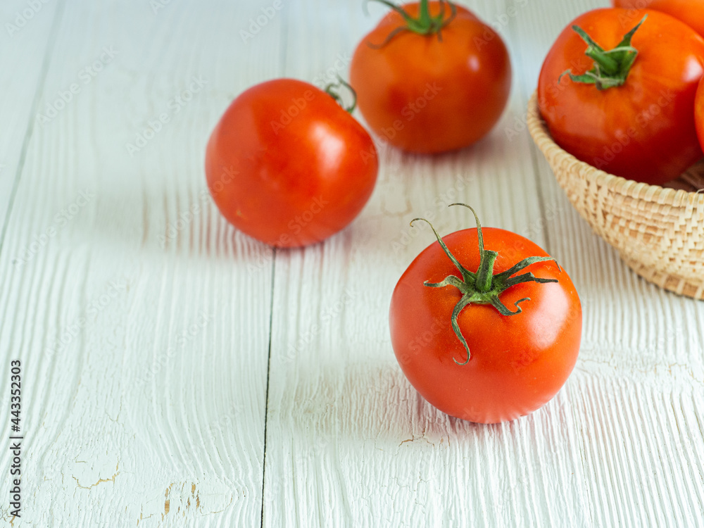 Focus tomato on white wood table, Copy space for word. Healthy food in ...