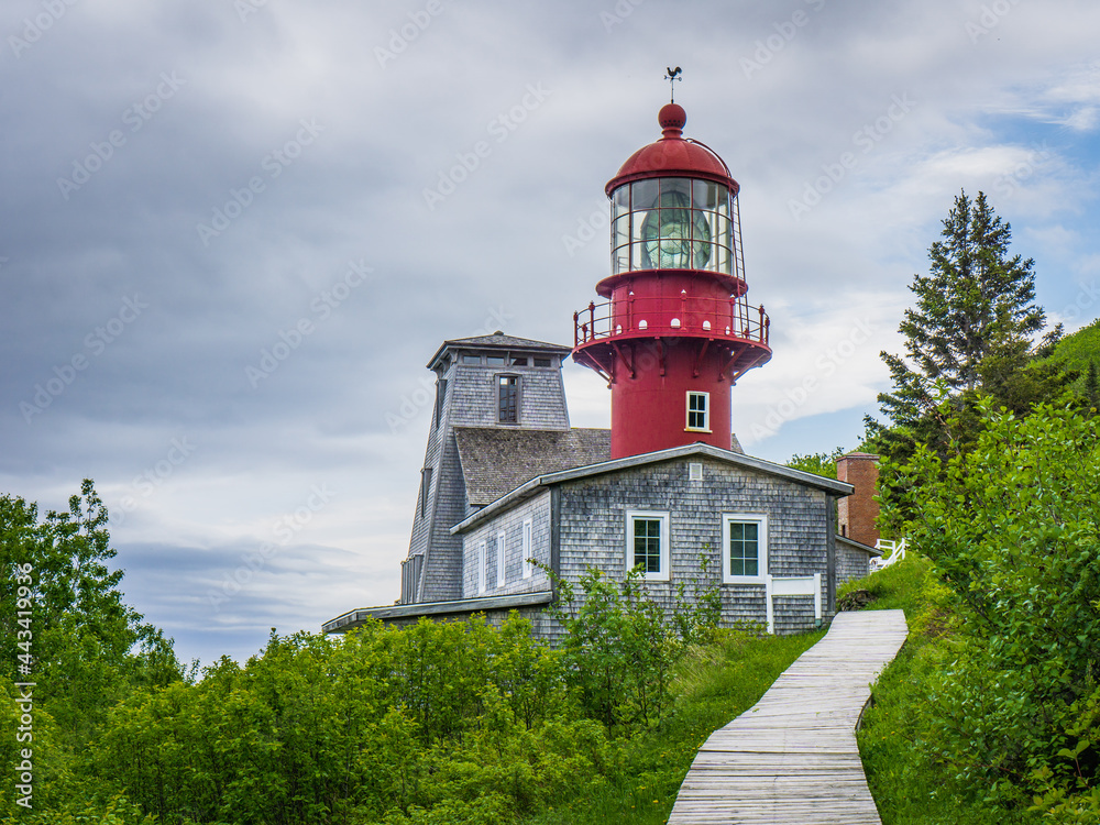View on the beautiful Pointe a la Renommée Lighthouse covered with ...