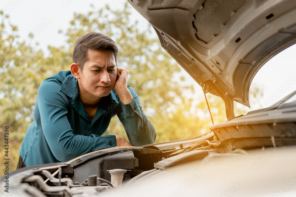 Man open car hood for repair as maintenance service. Man trying to ...
