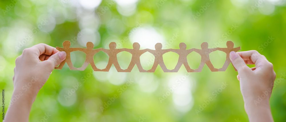 Paper Teamwork on Green Nature Background Stock Photo | Adobe Stock