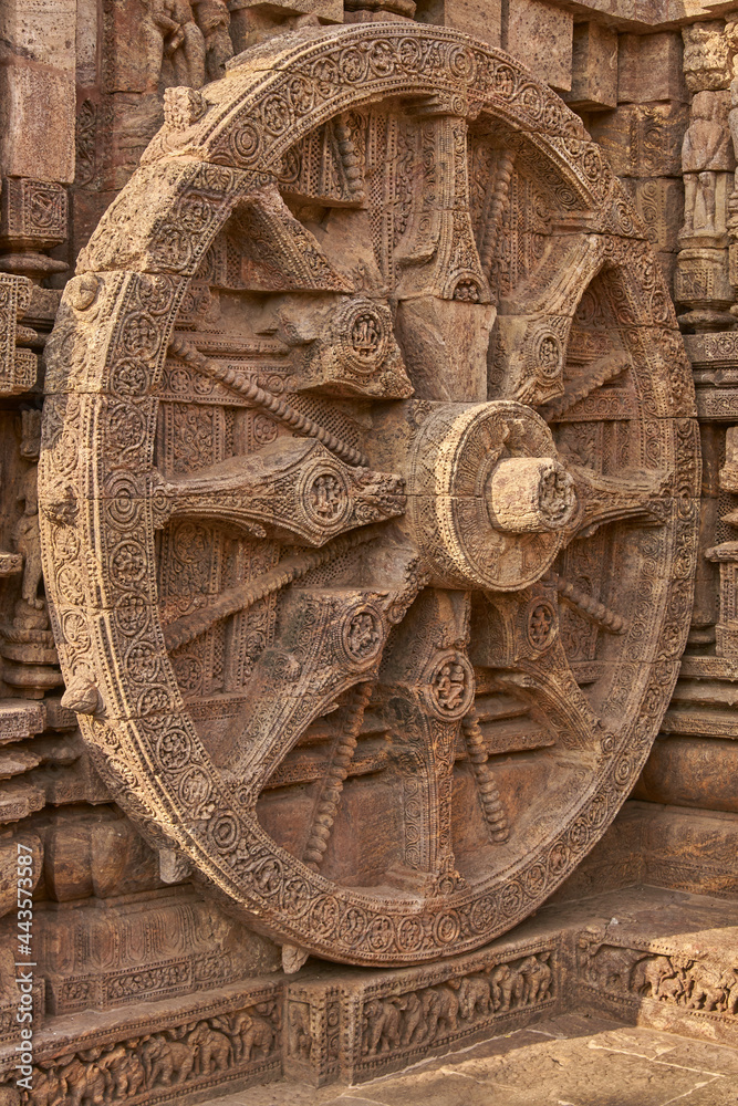 Detail of chariot wheel and religious carvings decorating the ancient ...