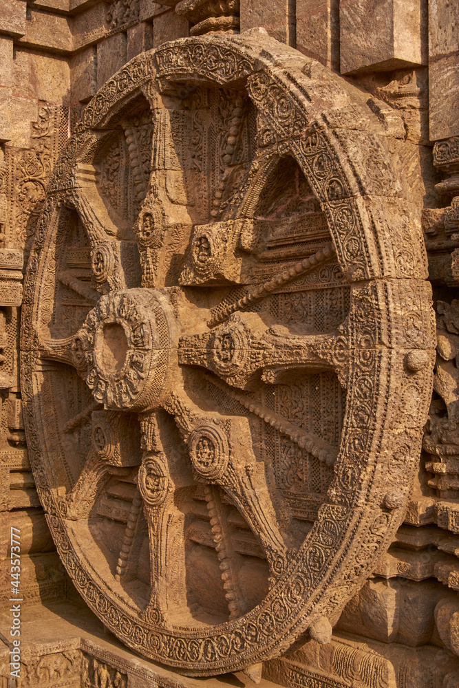 Detail of chariot wheel and religious carvings decorating the ancient ...