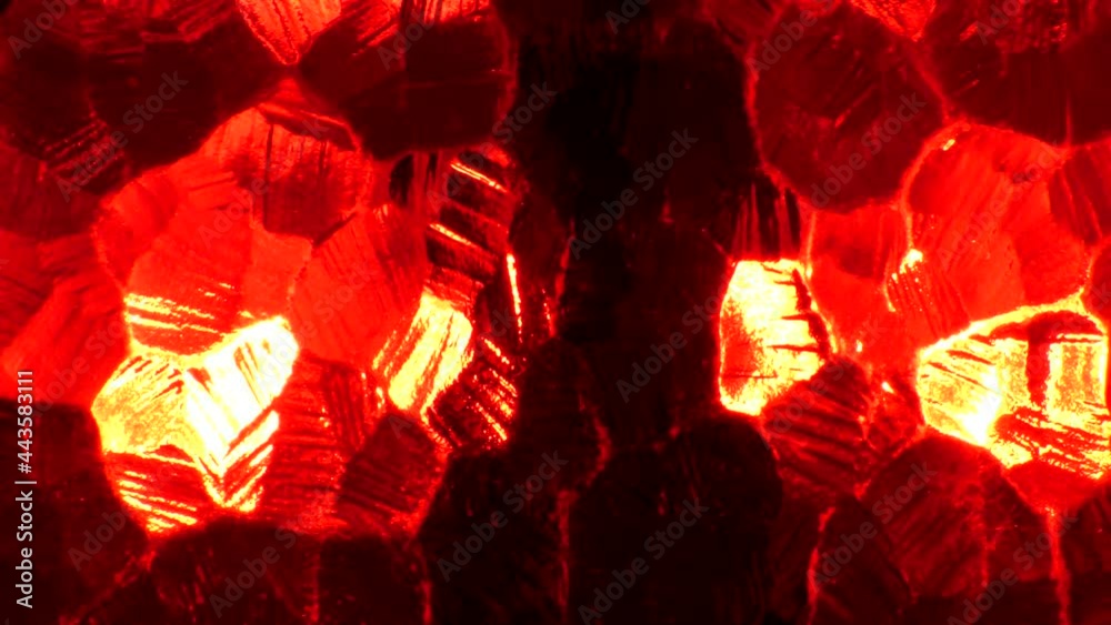 Red crystal abstract glass texture background. Camera movement along ...