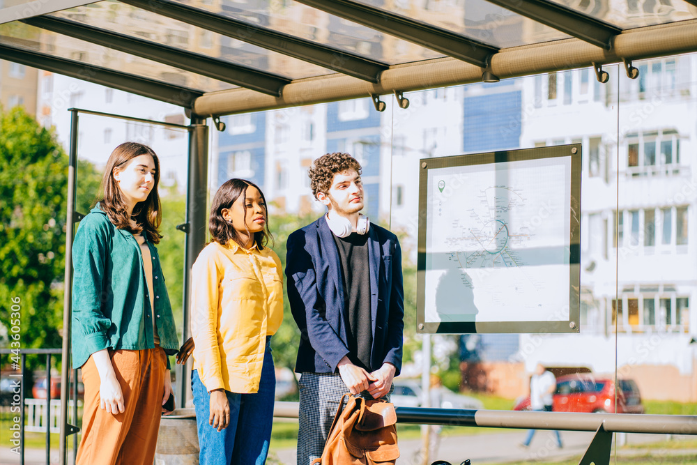 Queue Of People Waiting At Bus Stop. People waiting their bus at bus ...