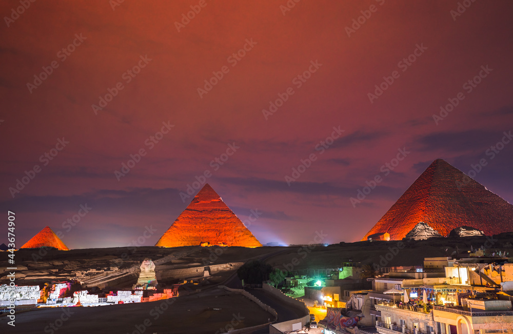 Illuminated egyptian pyramids Stock Photo | Adobe Stock