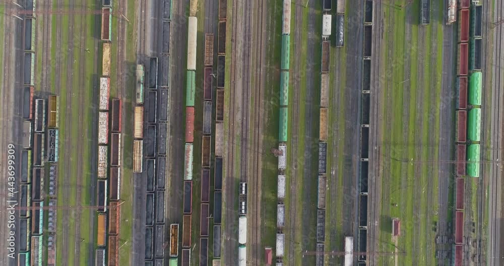 Flying over trains at the depot. Top view of freight trains at a ...