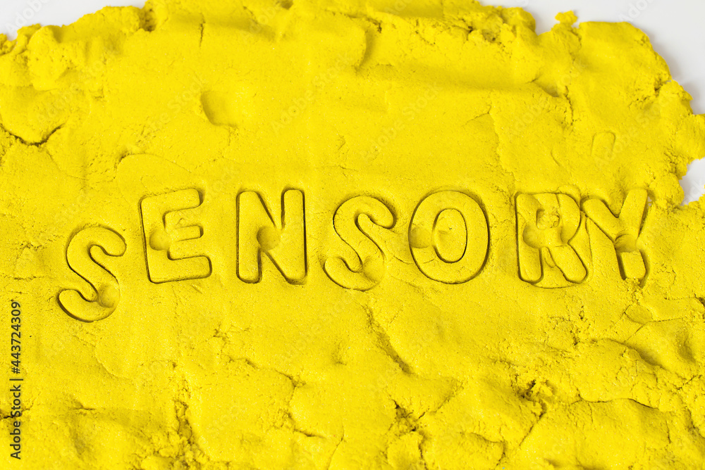 Foto de Sensory word and magic kinetic sand. Early sensory education ...
