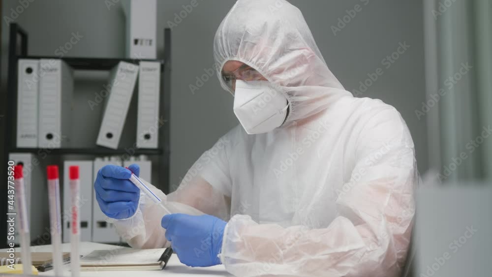 PCR test in laboratory, doctor holding COVID-19 Coronavirus swab ...