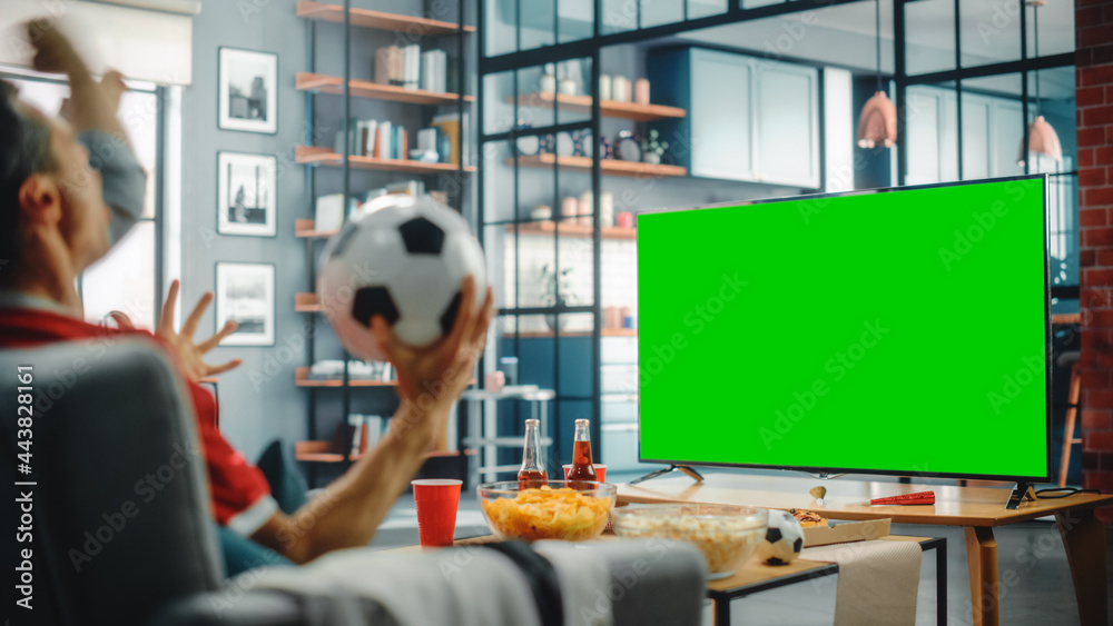 At Home Joyful Soccer Fans Sit on a Couch Watch Green Screen Chroma Key ...