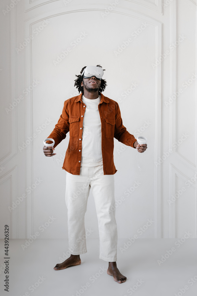 Content man playing video game in glasses of virtual reality Stock ...