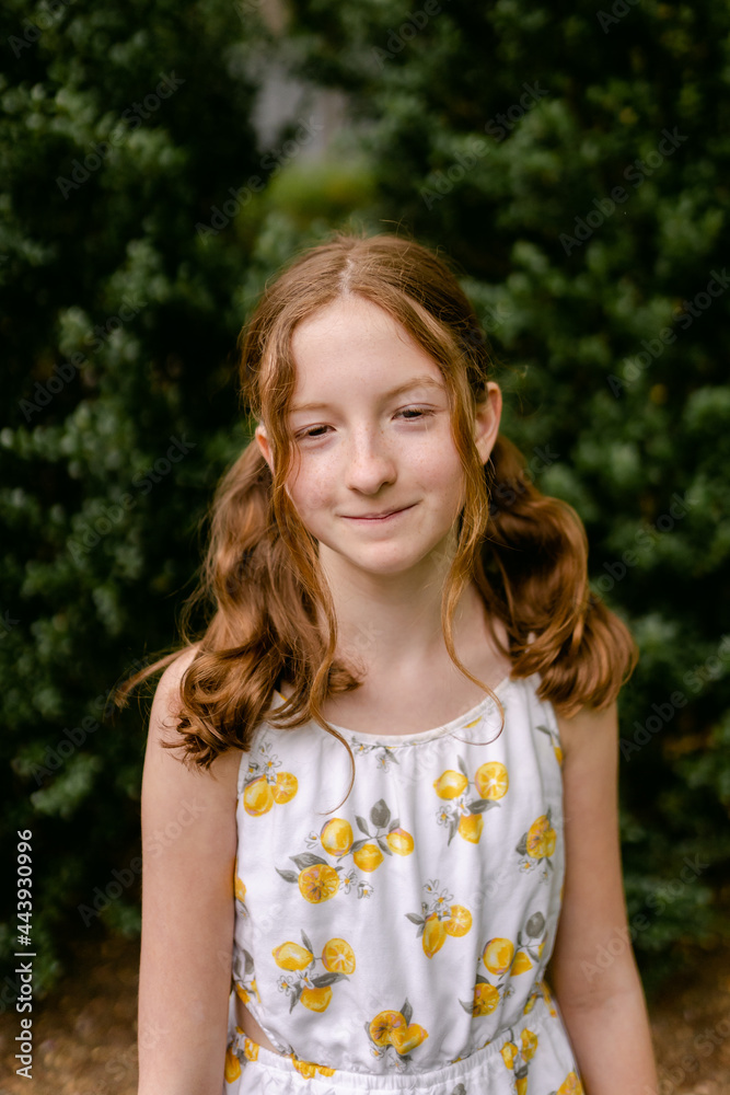 portrait of beautiful tween with red hair Stock Photo | Adobe Stock