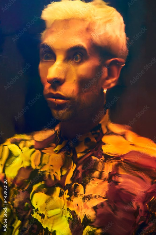 Distorted reflection of a shocked young man Stock Photo | Adobe Stock