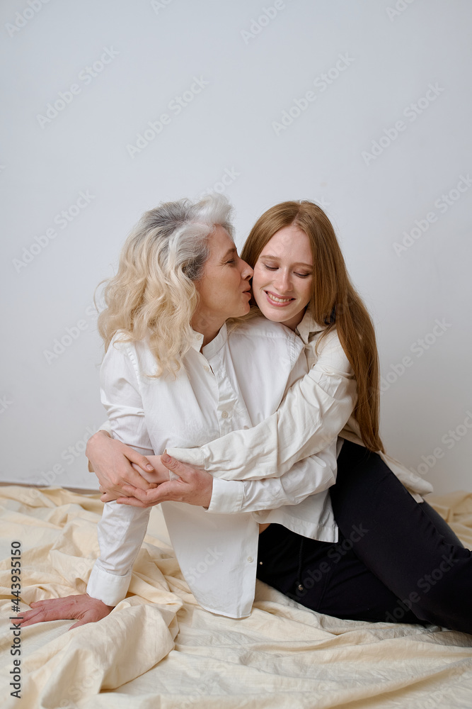 portraits of mother and daughter on the background Stock Photo | Adobe ...