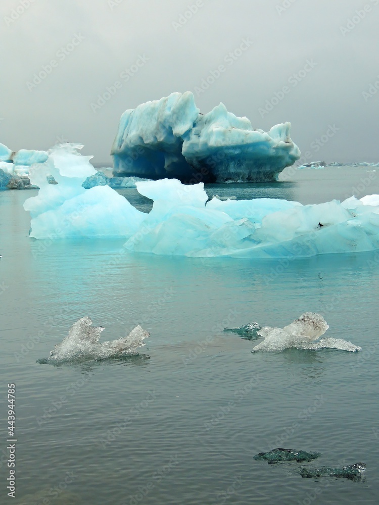 large blue icebergs floating at jokulsarlon along the ring road in ...