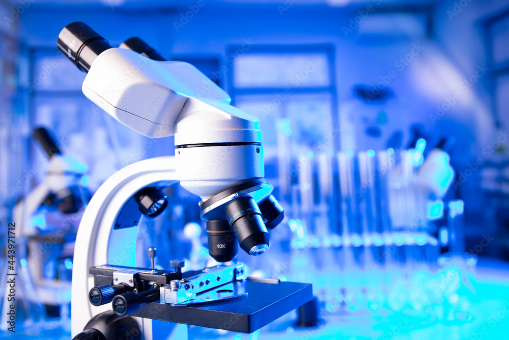 Laboratory investigations concerning covid pandemy. Microscope, glass ...