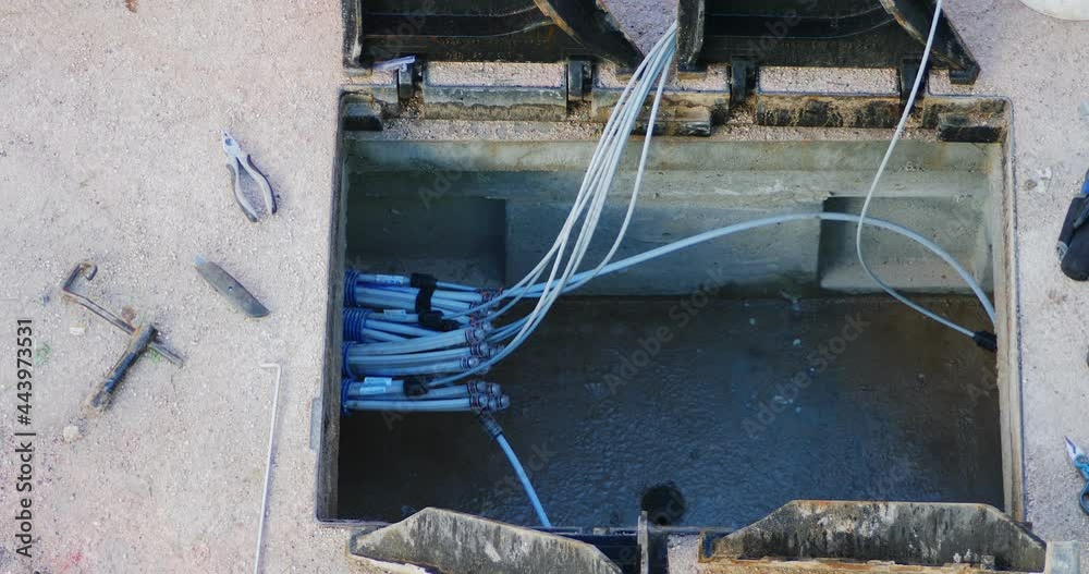 Stockvideon Worker made a break-in with an electric demolition hammer ...