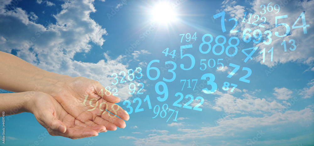 Numerology Concept Sky Website Banner - female cupped hands releasing a ...