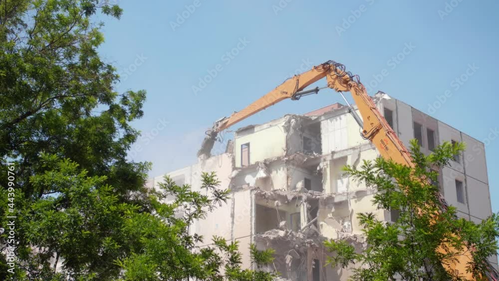 Excavator machinery working on demolition old house. Destructive ...